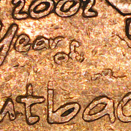 2002 1 dollar Australian coin Die fill Error – Zero Rising